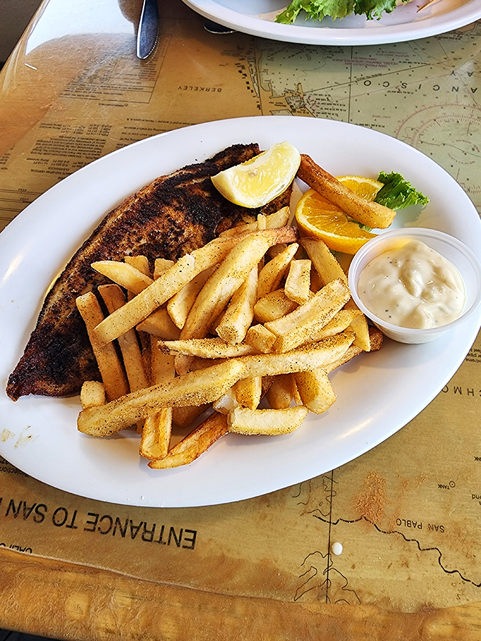 Blackened sole with fries that proves sometimes the simplest preparation lets the seafood's natural flavors take center stage.