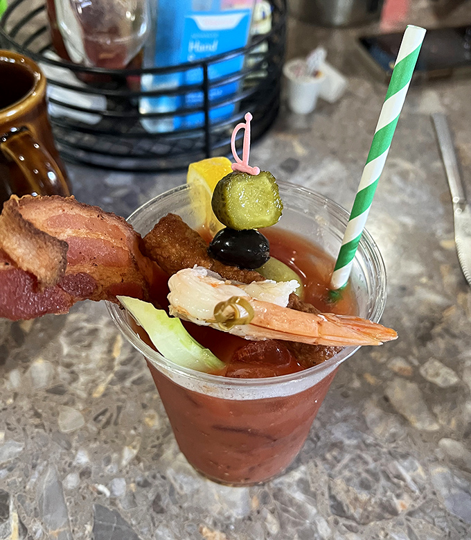 Their Bloody Mary isn't just a drink, it's an edible sculpture garden with enough garnishes to count as a small appetizer.
