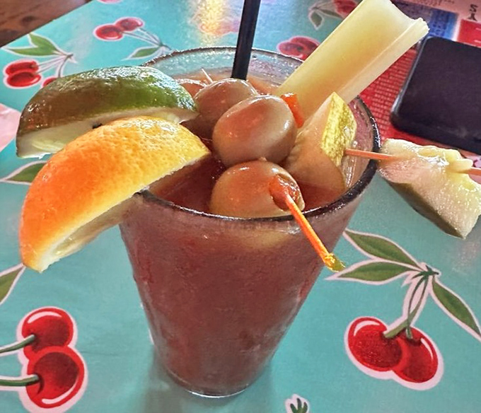 That bloody mary arrives dressed for success with enough garnish to qualify as a salad course.