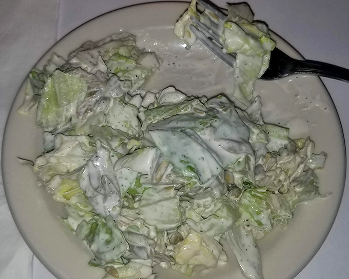 The blue cheese dressing isn't just a topping&mdash;it's practically a religion here, with chunks of cheese substantial enough to require a passport.