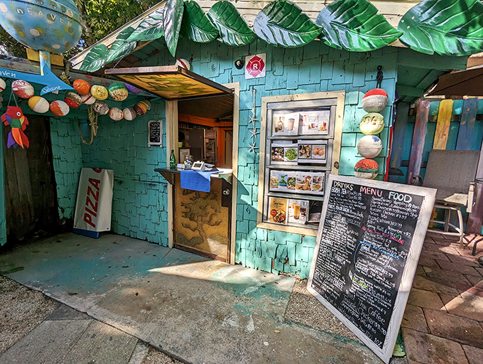 The turquoise caf&eacute; with its hand-painted menu board offers the kind of food that tastes better with sand between your toes.