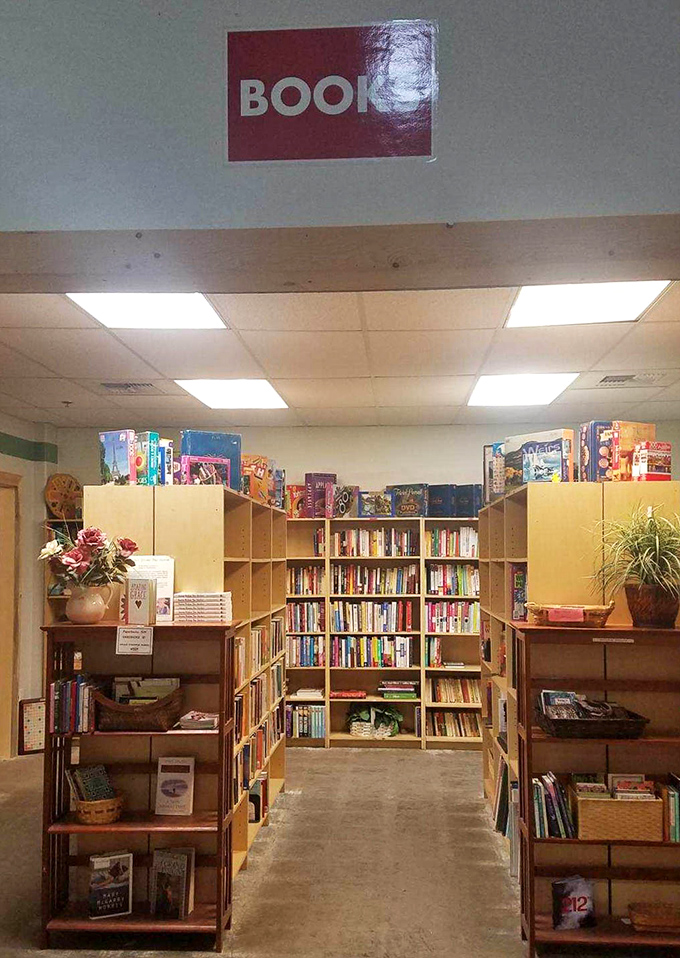The book section stands organized and inviting, a quiet corner where literary treasures wait to be discovered for pocket change.