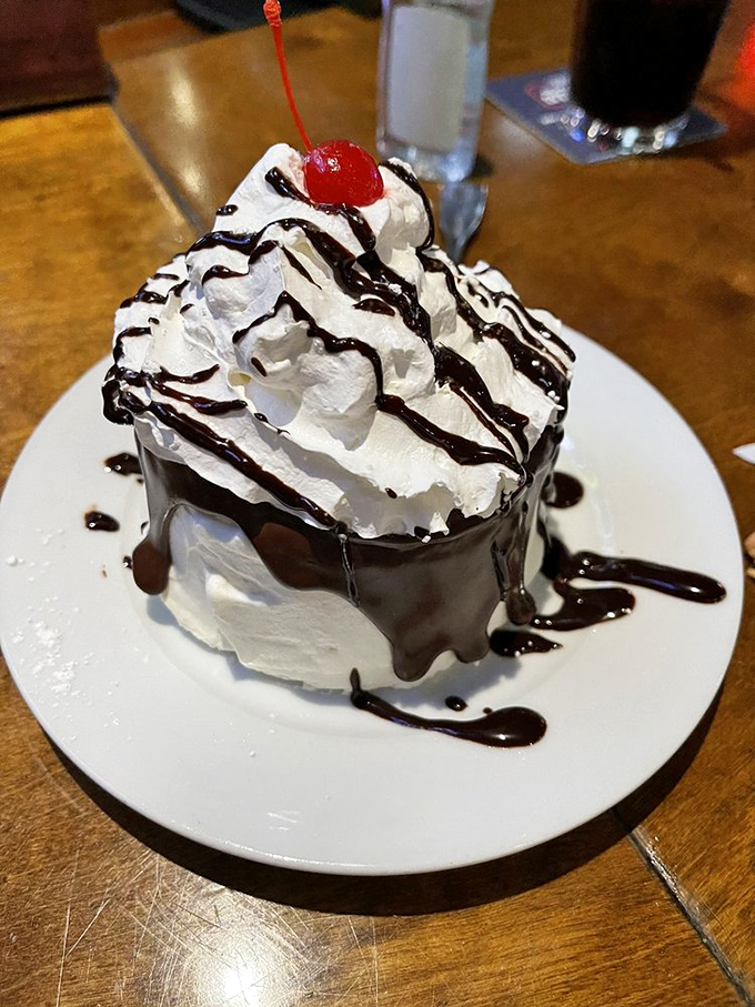 This Boston cream pie, crowned with whipped cream and chocolate drizzle, makes a compelling argument for dessert as a constitutional right.