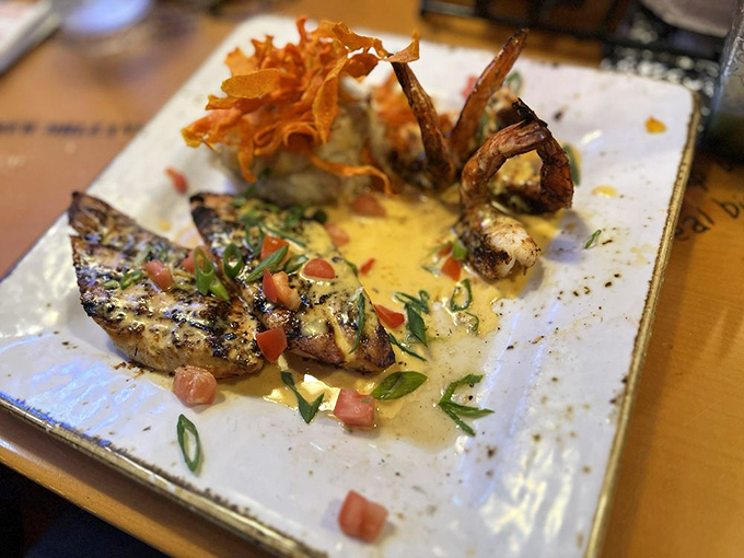 This isn't just fish&mdash;it's culinary artistry. Mahi Mahi bathed in a buttery sauce, garnished with fresh herbs and crispy accents.