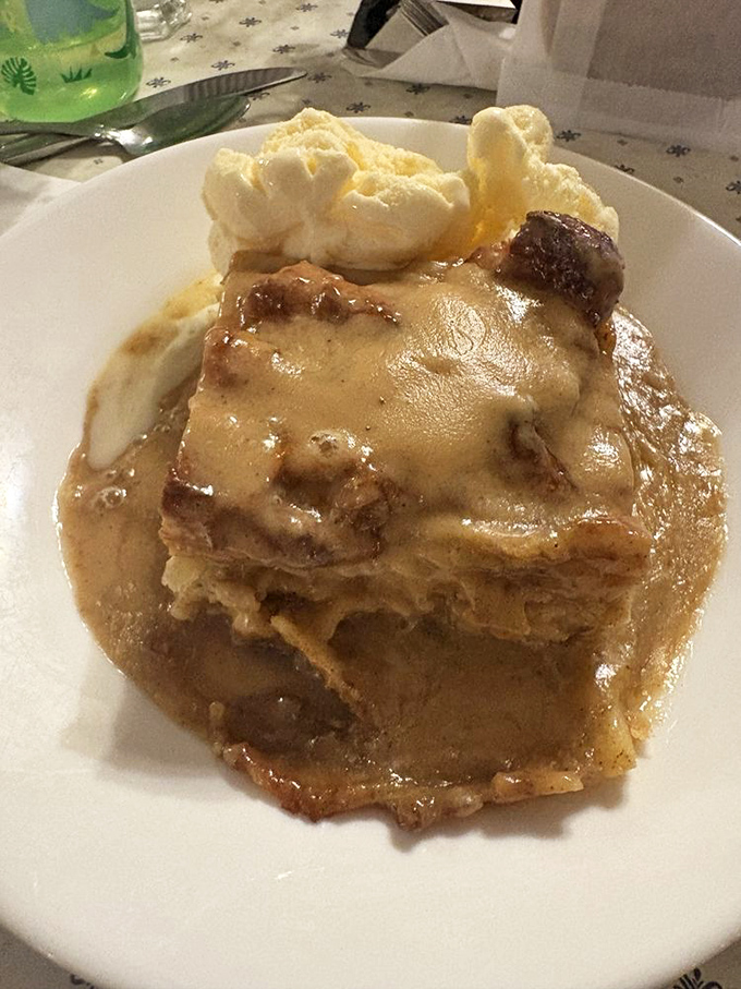Bread pudding swimming in caramel sauce with a scoop of ice cream &ndash; proof that the Amish understand indulgence better than anyone.