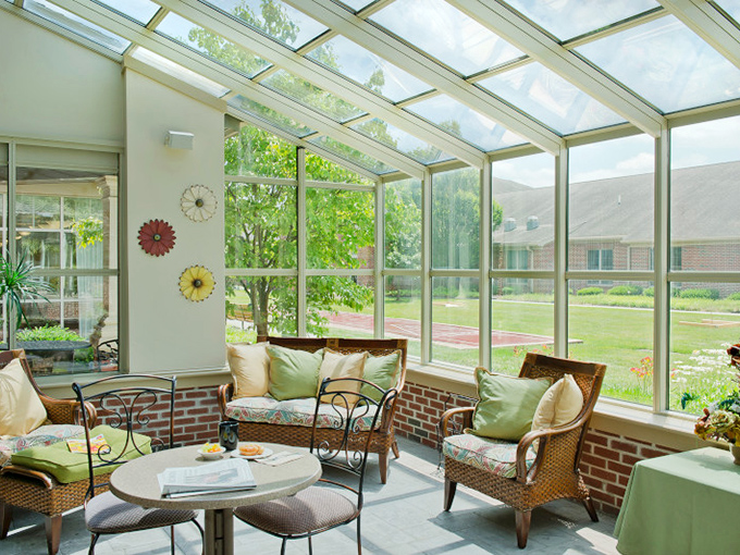 Sunrooms like this make Pennsylvania winters bearable&mdash;all the sunshine, none of the shoveling, and comfortable seating to boot.