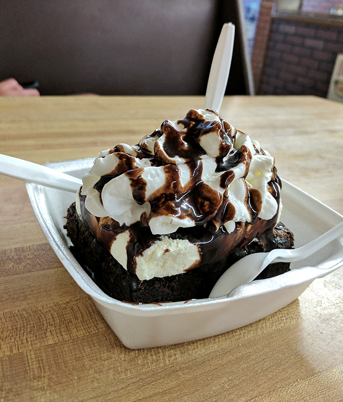 The brownie sundae doesn't just satisfy your sweet tooth&mdash;it throws a full-blown celebration for it, complete with whipped cream confetti.