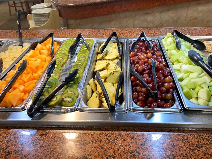 The fruit bar offers a moment of virtuous eating before you inevitably return to the fried section. It's what nutritionists call "balance."