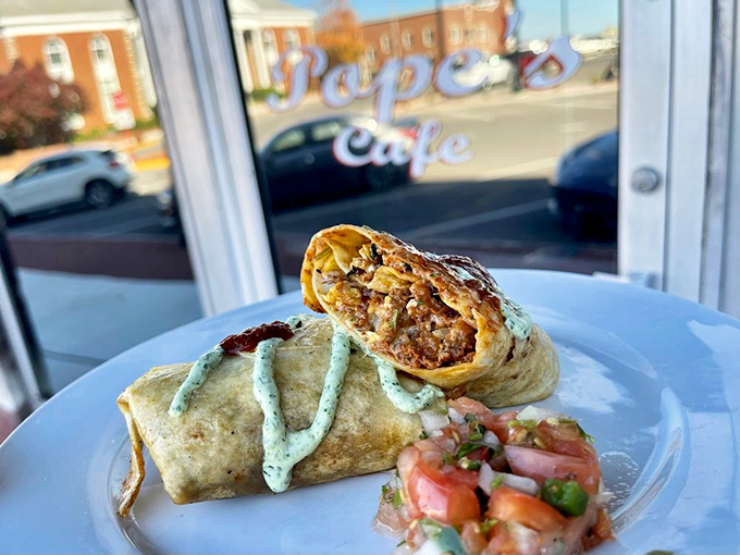 Their burrito isn't trying to be authentic Mexican&mdash;it's authentically Pope's, with a creamy sauce that'll have you plotting your next visit.