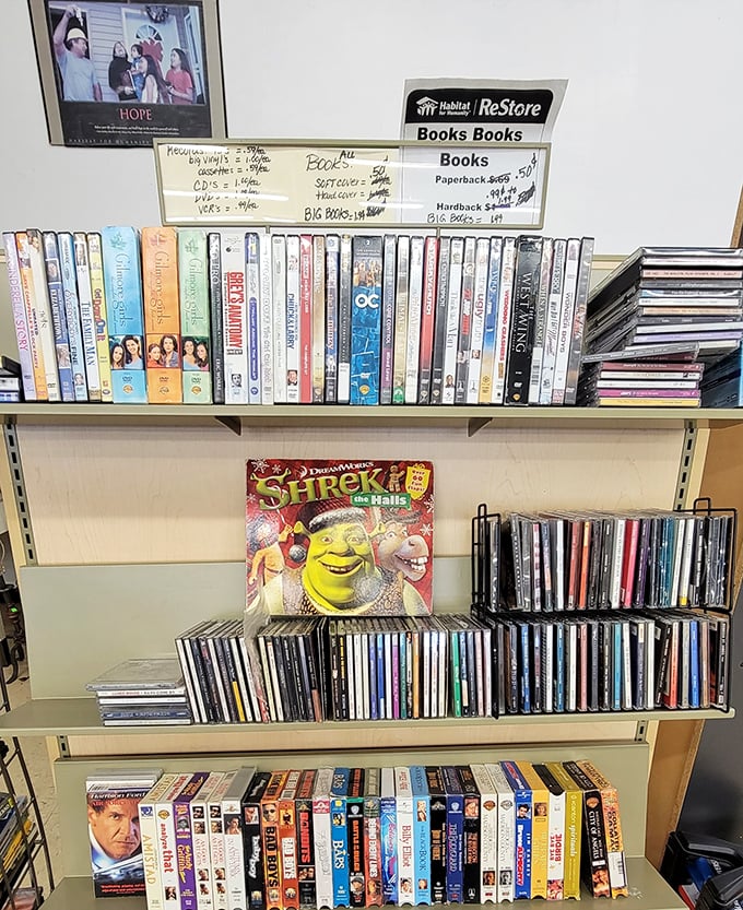 Movie night essentials line these shelves, where yesterday's blockbusters cost less than the popcorn at today's theaters.