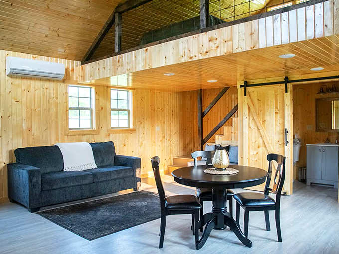 Tiny home, enormous charm. The cleverly designed interior makes brilliant use of space while the warm wood creates an atmosphere of cozy sophistication.