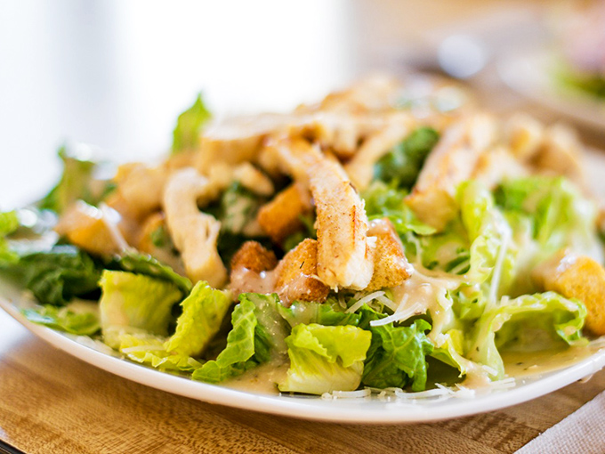 A Caesar salad that doesn't apologize for being exactly what it should be&mdash;crisp, creamy, and the perfect counterpoint to pizza indulgence.