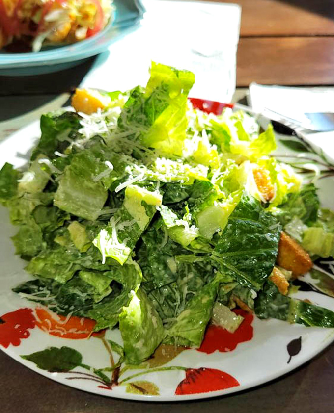 Even the greens get special treatment. This Caesar salad offers the perfect palate cleanser between bites of smoky indulgence.