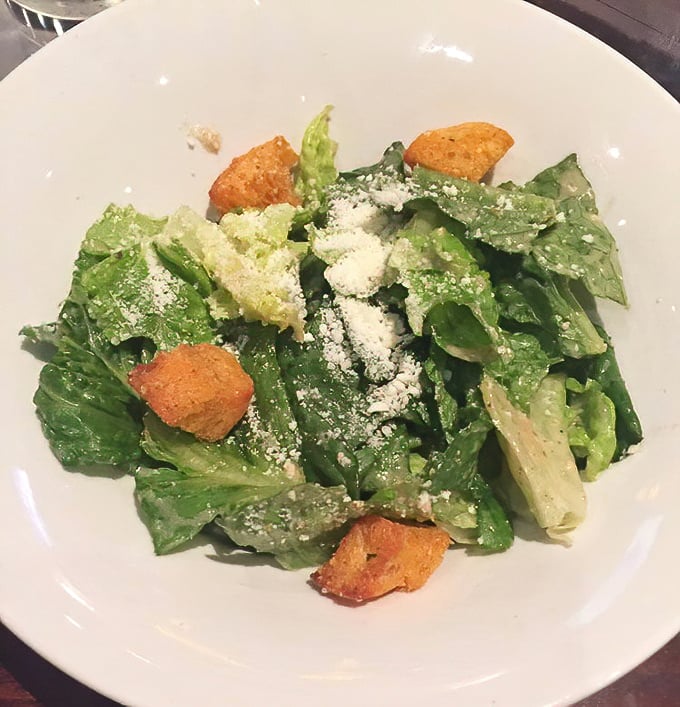A Caesar salad that Julius himself would approve of&mdash;crisp romaine, house-made croutons, and just enough dressing to make each bite worth the inevitable cheese-in-teeth situation.