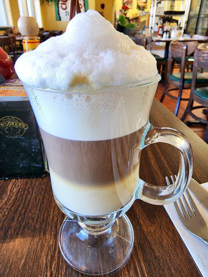 Coffee elevated to an art form&mdash;layered, frothy, and tall enough to have its own zip code. Morning fuel that doubles as dessert.