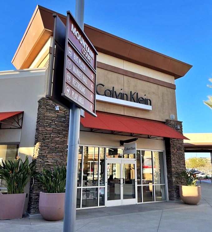 Calvin Klein's storefront embodies the clean lines and minimalist aesthetic the brand is famous for. Fashion simplicity in architectural form.