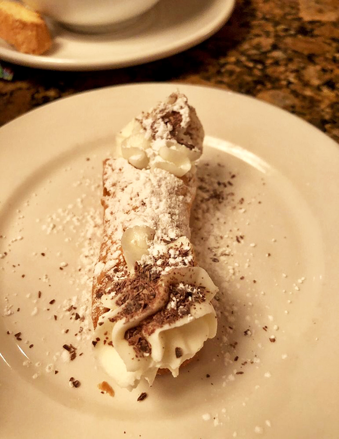 This cannoli isn't just dessert&mdash;it's edible architecture with a creamy filling that makes people forget their table manners and lick the plate.