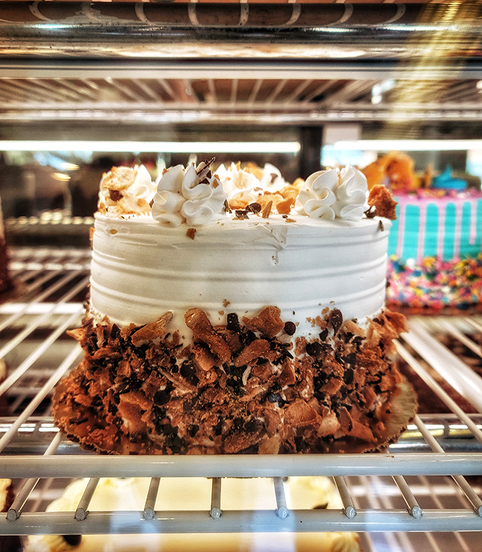 This cake isn't just wearing chocolate crumbles&mdash;it's flaunting them like a fashionista shows off a designer accessory. Edible couture at its finest.