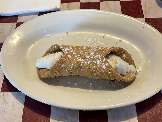 Not just dessert&mdash;a statement. This cannoli, with its crisp shell and creamy filling, is the perfect punctuation mark to end your tomato pie adventure.
