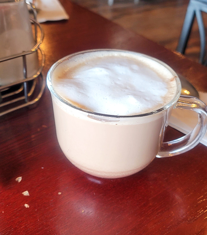 Coffee served in a clear mug &ndash; because when it's this good, it deserves to be seen, appreciated, and promptly Instagrammed by your grandkids.