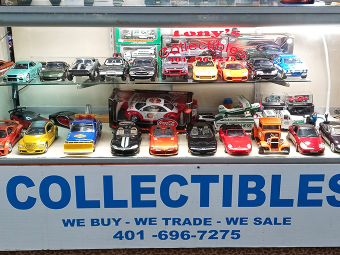 Miniature automotive dreams parked behind glass. Each tiny vehicle carries gigantic memories&mdash;especially that Coca-Cola racer that's calling your name.