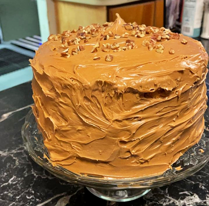 Not all heroes wear capes&mdash;some wear caramel frosting and pecans. This towering cake is what dessert dreams are made of.