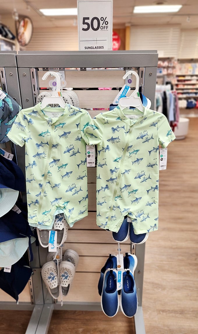 Tiny shark rompers that make grandparents spontaneously reach for credit cards. These baby outfits are scientifically engineered to elicit "awwws" from everyone within eyesight.