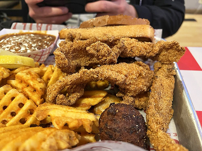 The catfish arrives golden and crispy, a Southern classic that reminds you Arkansas knows its way around more than just smoke and fire.