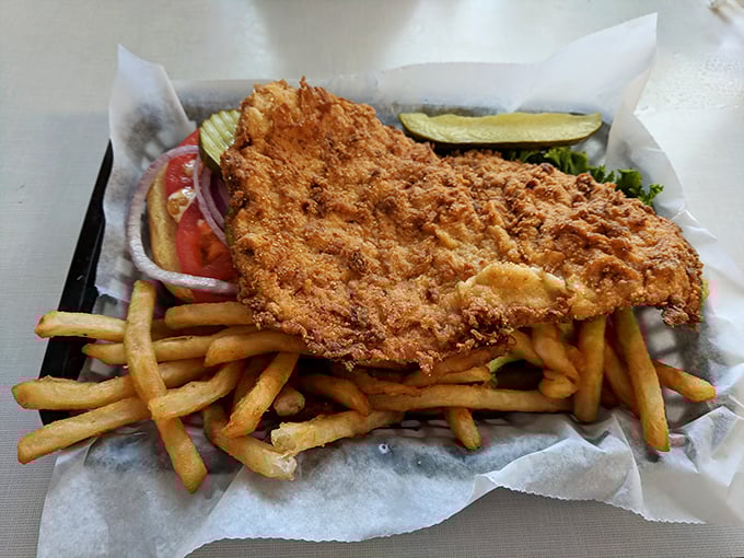 This isn't just a tenderloin&mdash;it's an edible frisbee of crispy, golden perfection that makes you wonder why anyone would ever eat anything else.