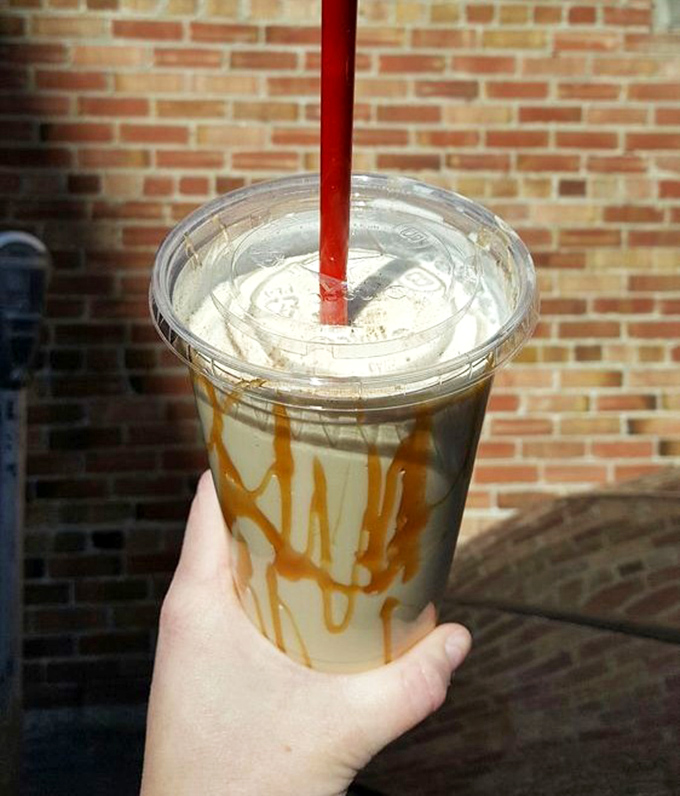 This isn't just a shake; it's caramel-streaked liquid happiness in a cup. The kind of drink that makes adults remember why being a kid was awesome.
