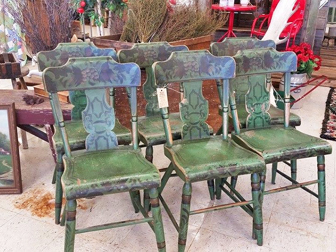 Weathered green chairs with hand-painted details that modern furniture factories could never replicate with soul.