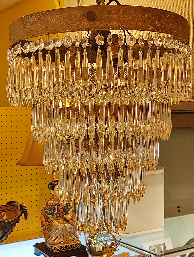Crystal chandeliers that have seen more dinner parties than a catering company. Instant glamour for the price of a mediocre hotel stay.