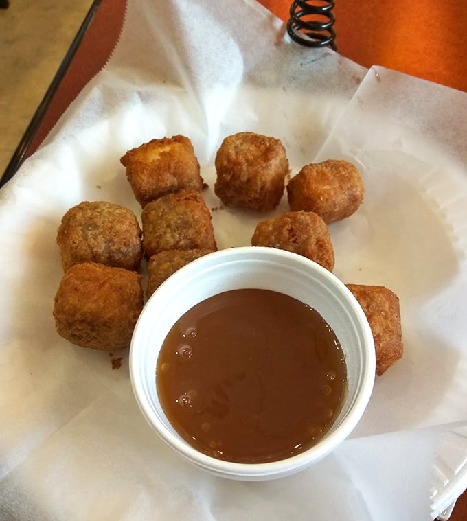 These golden-fried cheese bites aren't just appetizers&mdash;they're little caramel-dipped promises that good things come to those willing to start with dessert. Life lessons in every bite.