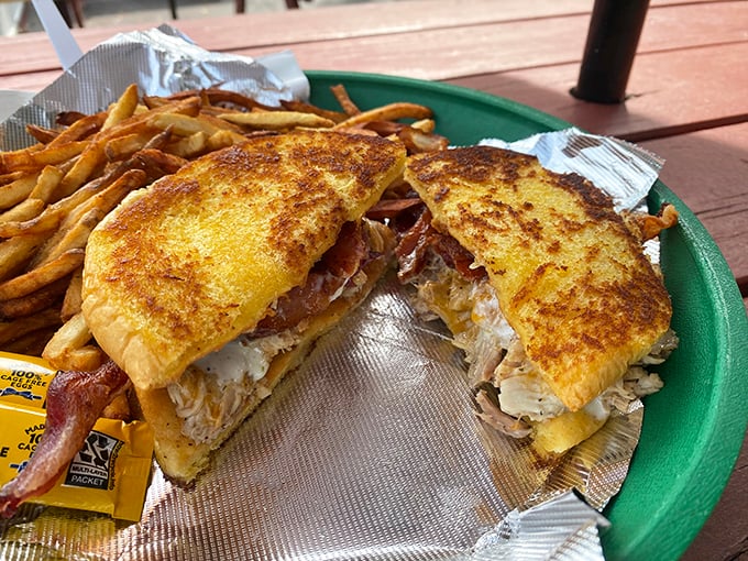 This isn't just a sandwich; it's architecture – a carefully constructed monument to the art of melted cheese and smoky goodness.