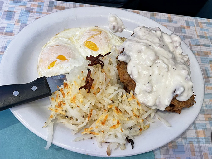 Chicken fried steak swimming in gravy so good you'll want to write it love letters. The hash browns provide the perfect crispy counterpoint.
