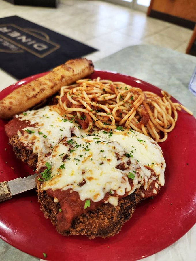 Chicken Parmesan that doesn't mess around. That garlic bread isn't just a side&mdash;it's there to ensure not a drop of sauce goes unloved.