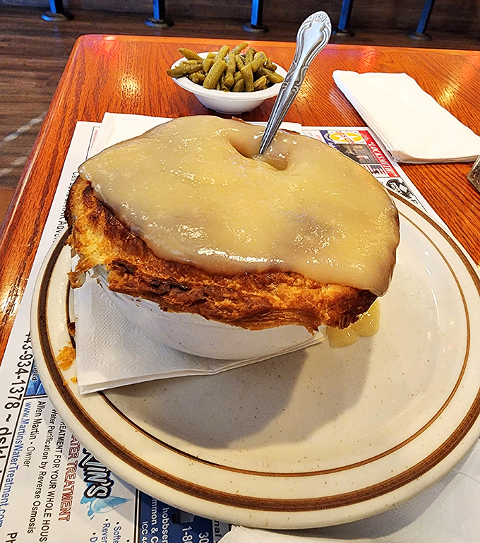 This chicken pot pie isn't just comfort food—it's a comfort fortress. The golden crust barely contains the savory treasures hiding underneath.