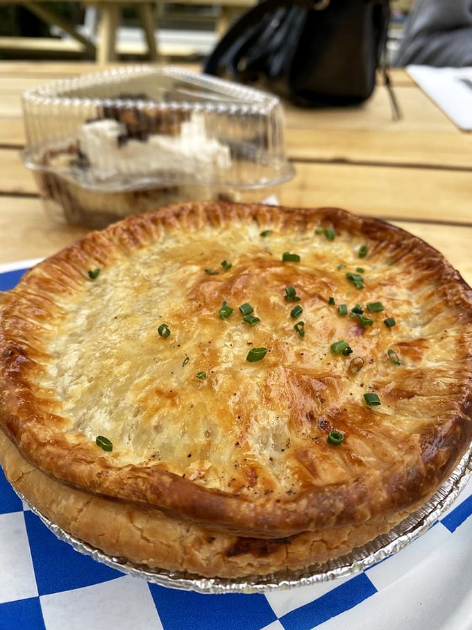 Golden, flaky crust sealing in savory secrets. This chicken pot pie isn't just comfort food &ndash; it's architectural genius with a side of nostalgia.