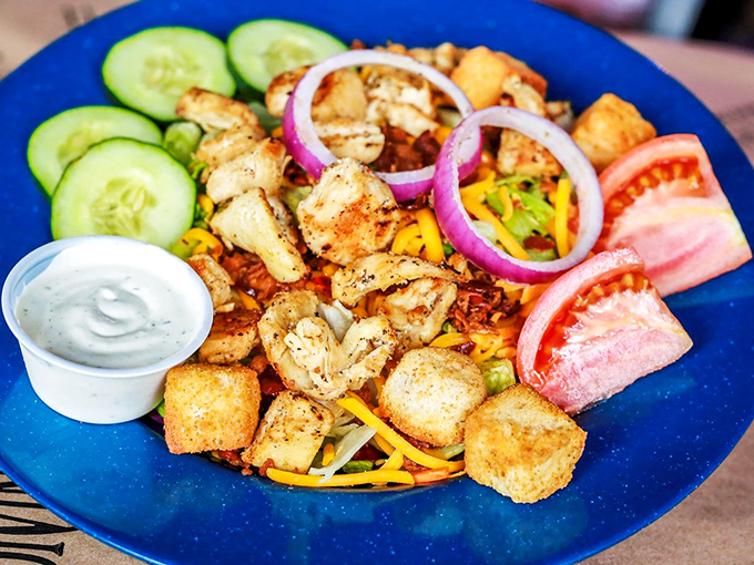 A salad that doesn't apologize for being healthy &ndash; it's too busy showing off grilled chicken, fresh veggies, and colors that pop like a coastal sunset.