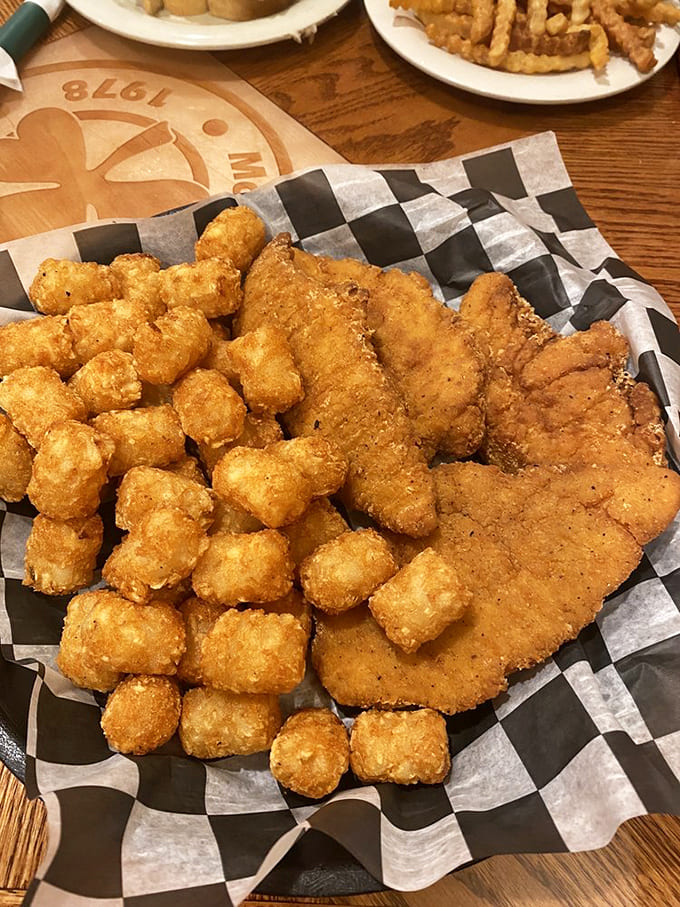Golden-fried chicken strips and tater tots &ndash; proof that sometimes the simplest pleasures are the most satisfying. Childhood favorites, all grown up.