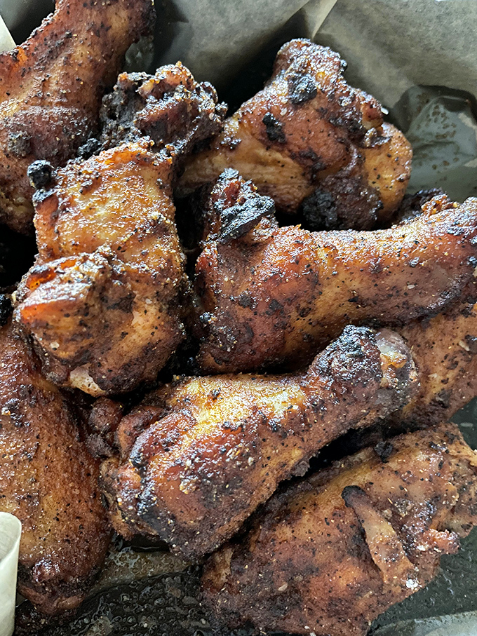 Wings that spent quality time in the smoker developing character, depth, and that glorious crispy exterior we all crave.