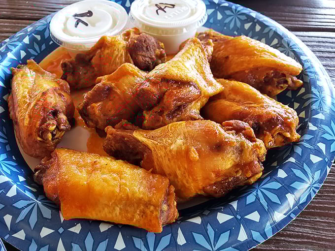 Wings that prove this place isn't just a one-trick seafood pony. Crispy, saucy, and demanding to be devoured before your entr&eacute;e arrives.