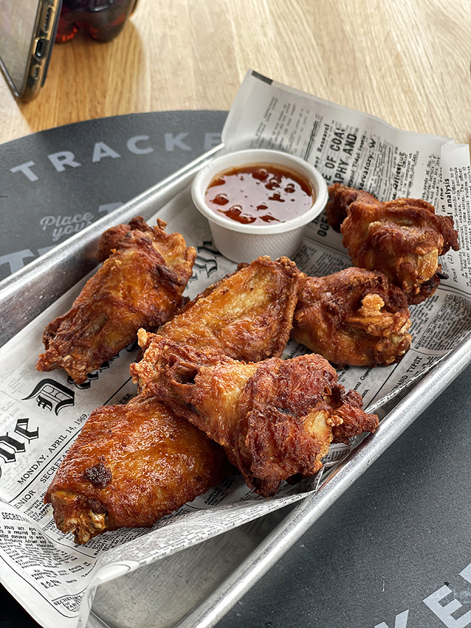 These aren't just wings; they're crispy, golden-brown tickets to flavor town, served with a side of "why didn't I order more?"