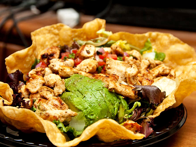 When salad goes to Hollywood &ndash; crispy tortilla bowl cradles fresh greens and grilled chicken in a healthy-ish California compromise.