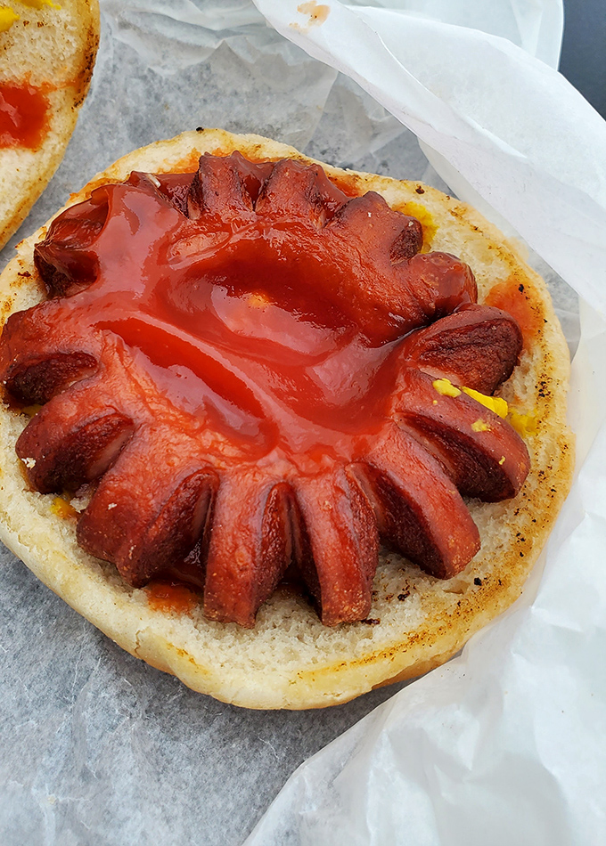 The humble chili dog, elevated to art form. That sunburst pattern of meat and sauce is practically begging to be photographed before devoured.