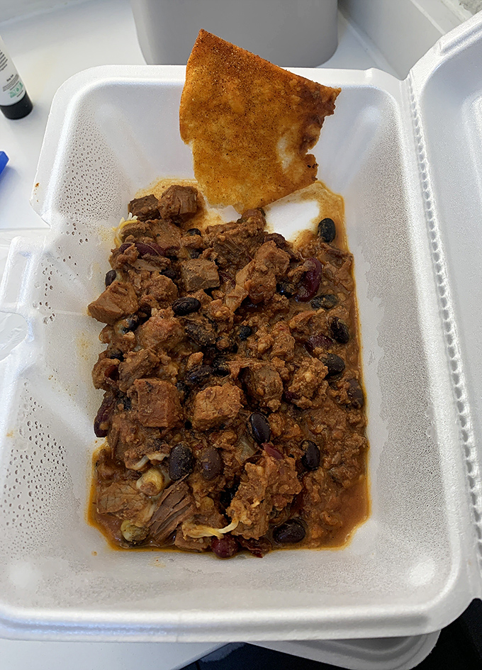 Chili that looks like it's been simmering since the Carter administration, with a cornbread sidekick that's ready for dunking duty.