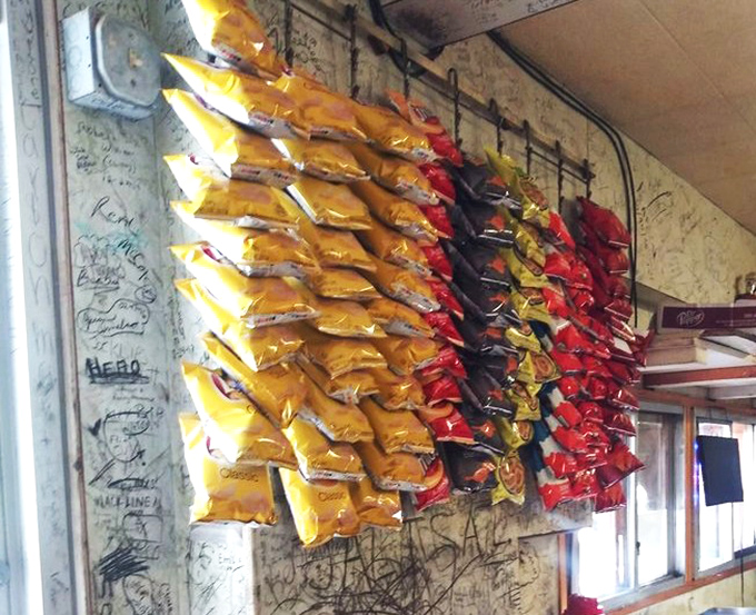 Chip bags hanging like colorful stalactites&mdash;the perfect crunchy sidekick to the main event. Simple pleasures in a world gone complicated.