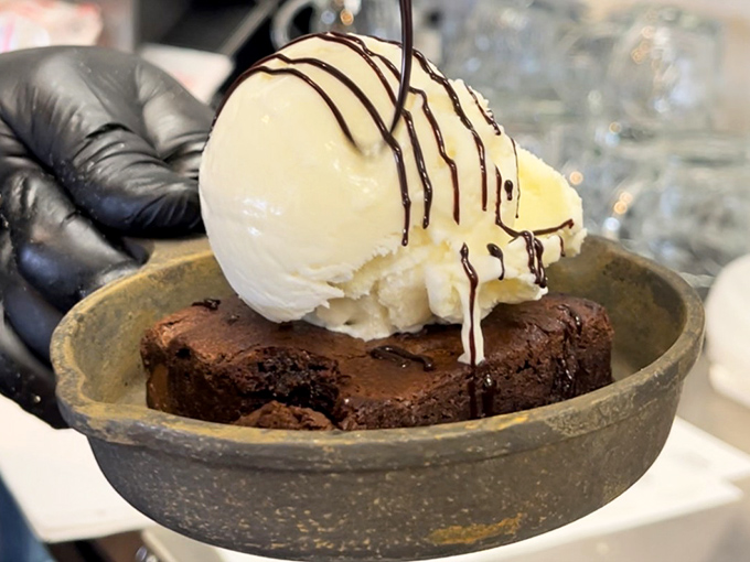 A brownie that doesn't just satisfy your sweet tooth &ndash; it throws a block party for all your taste buds and invites ice cream as the guest of honor.