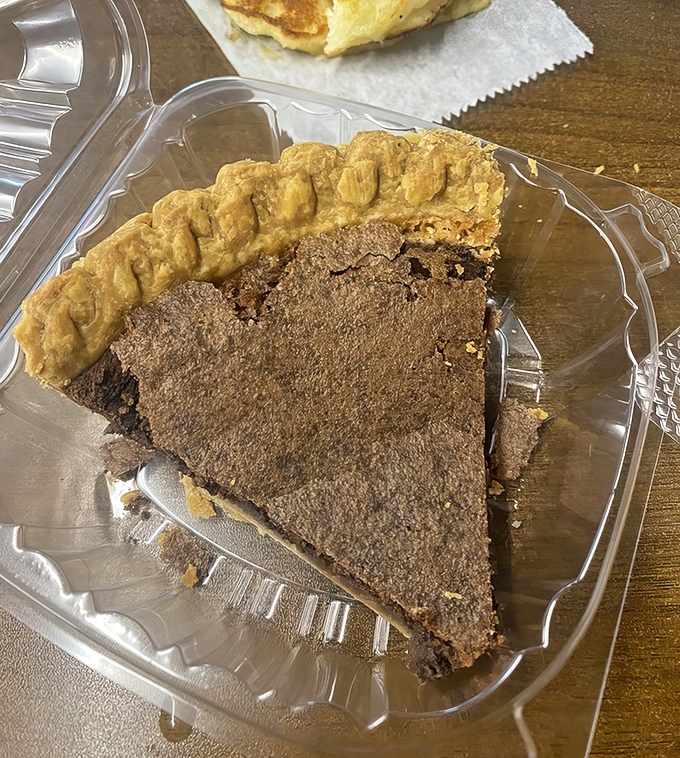 Cheese pie with that signature caramelized top – proof that the simplest ingredients often create the most memorable finales to a Southern meal.