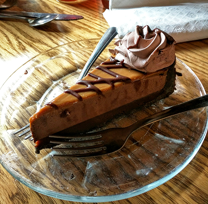 Chocolate pie with caramel drizzle and whipped cream that makes dessert decisions dangerously easy and wonderfully indulgent every single time.
